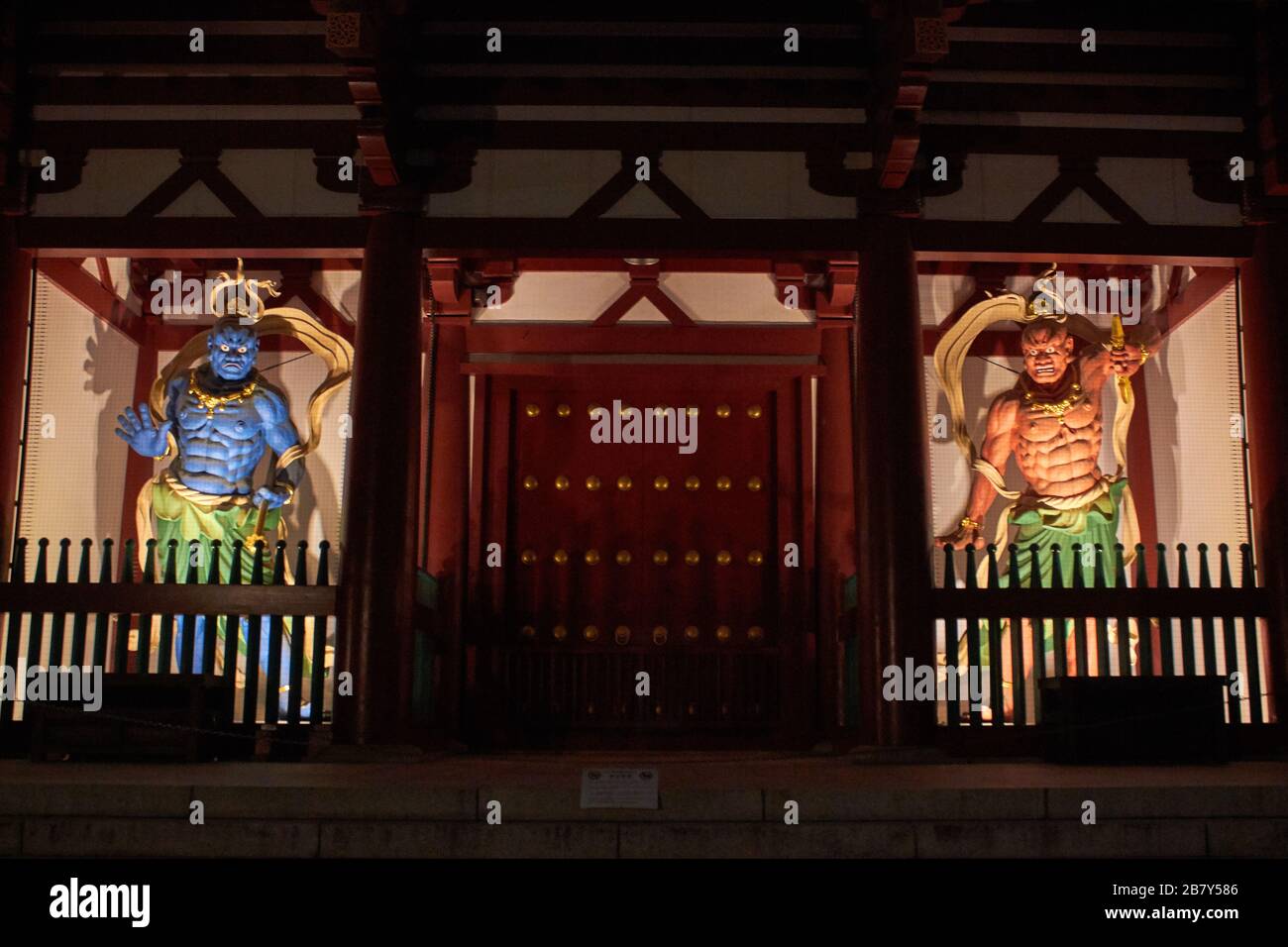 Demon sculptures saving the gate of the temple Stock Photo - Alamy