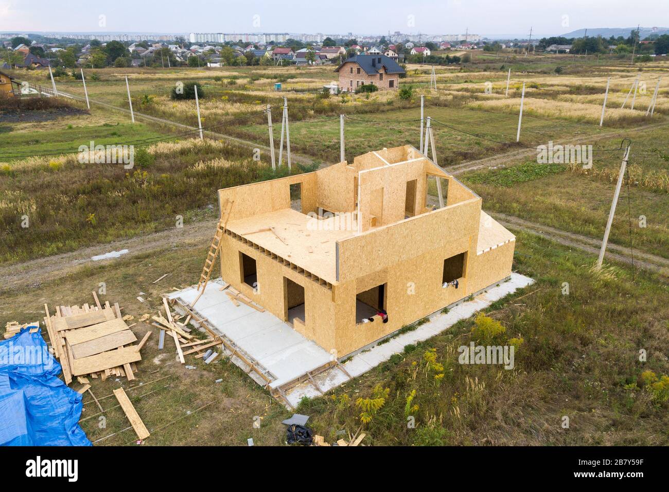 Construction of new and modern modular house. Walls made from composite ...