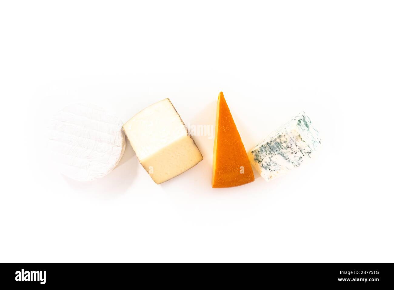 Variety of large wedges gourmet cheese on a white background Stock ...