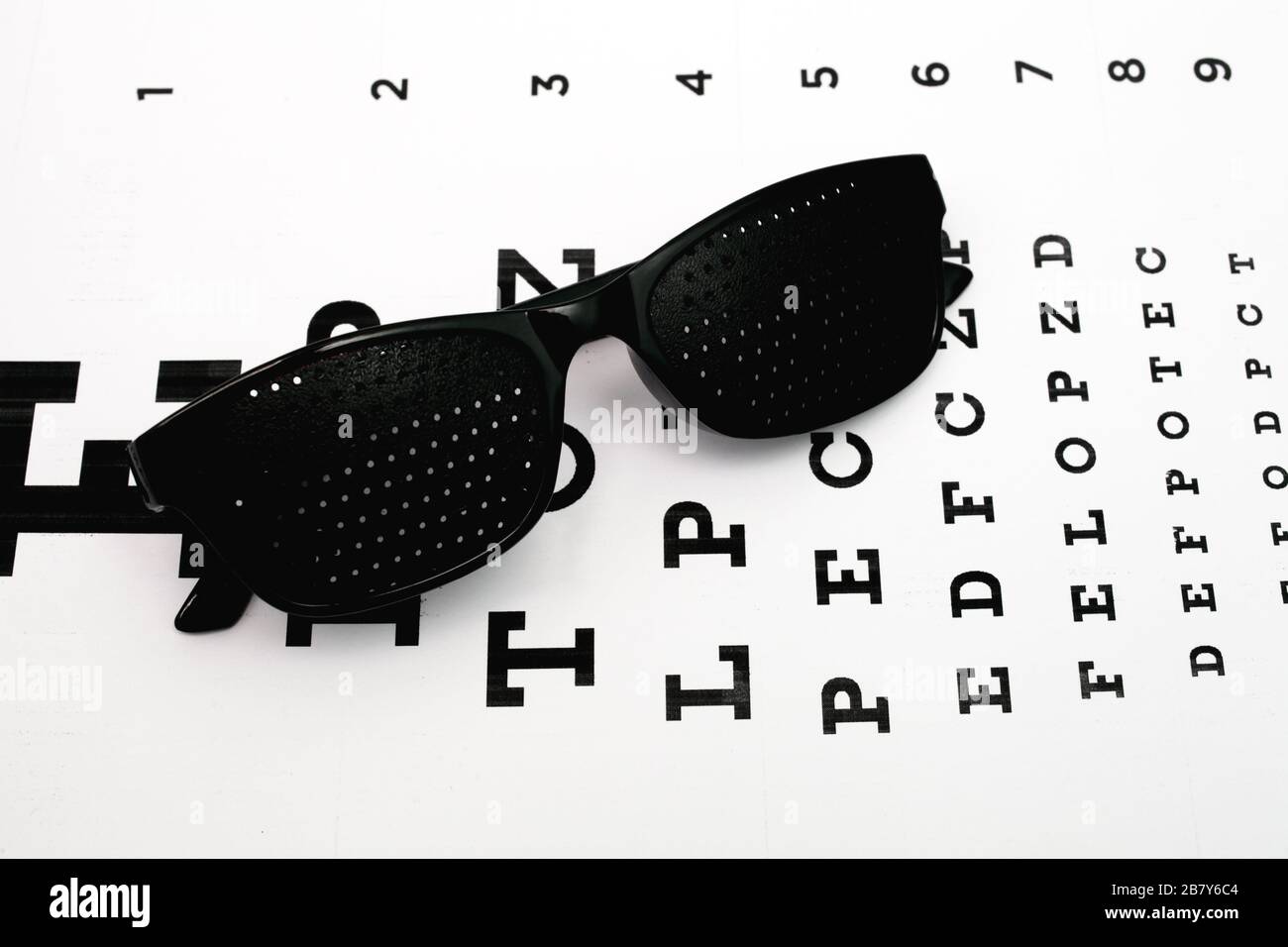 Perforated training glasses are on the table for eye examination Stock ...