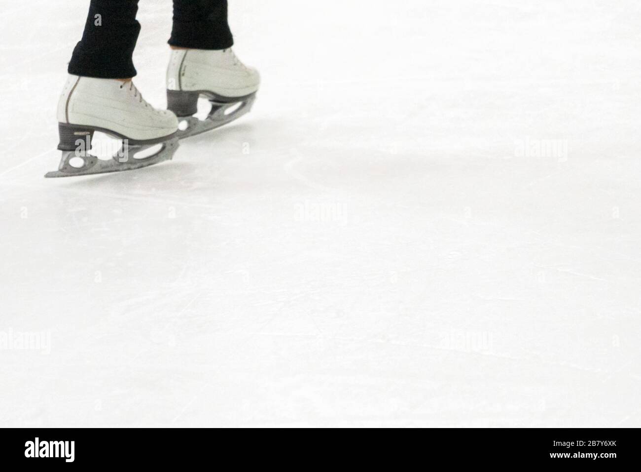 View of figure skater feet at the figure skating practice Stock Photo ...