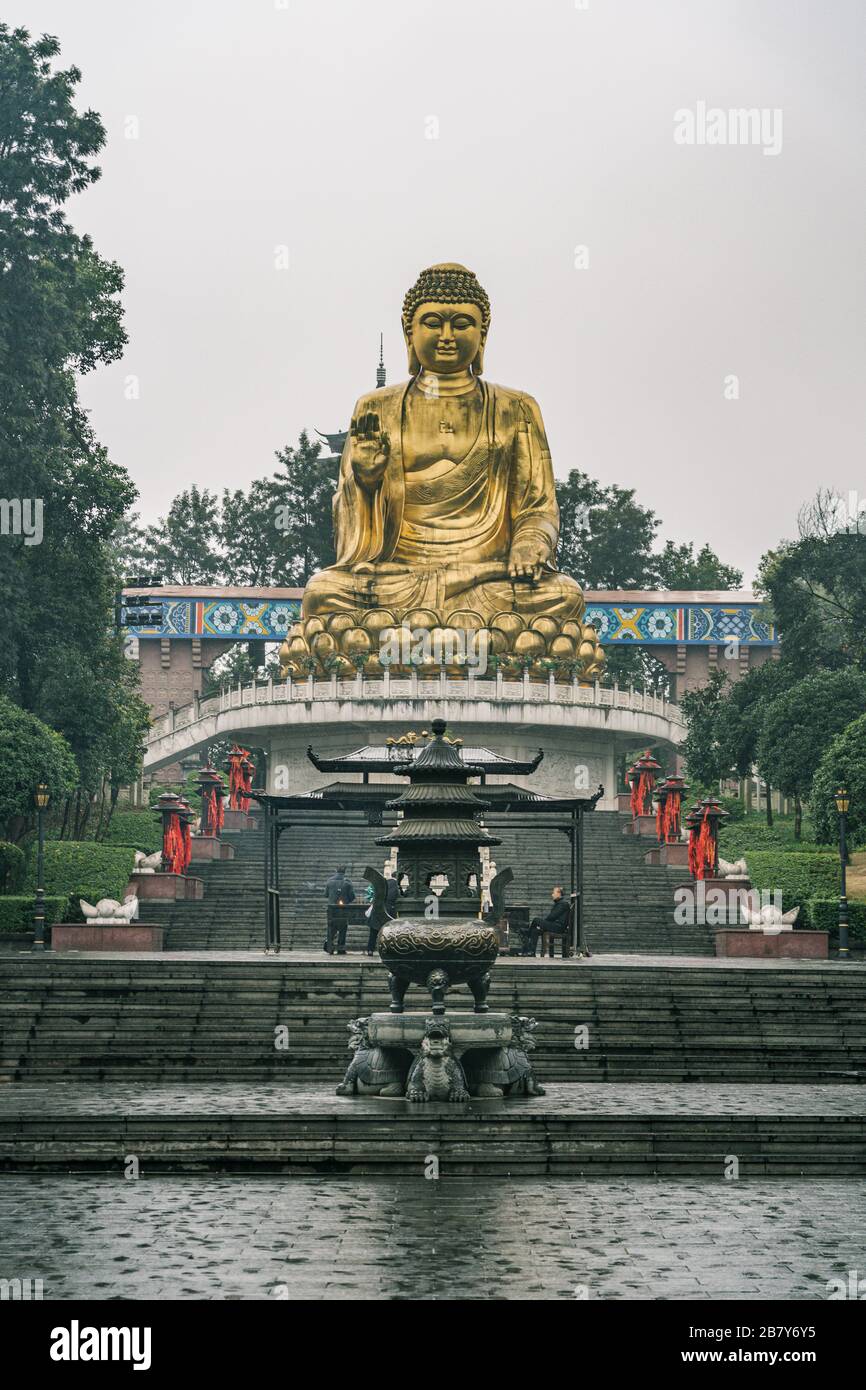 Chongqing, China - Dec 20, 2019: Golden budda statue in Hua Yan Temple ...
