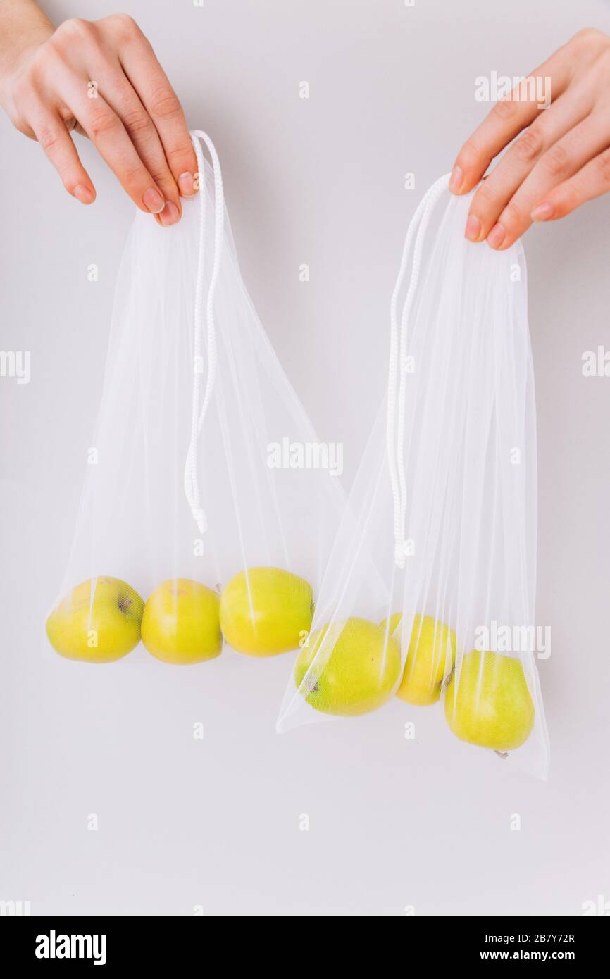 Eco packs. Eco bag with apples. Purchase without harm to nature in anti ...