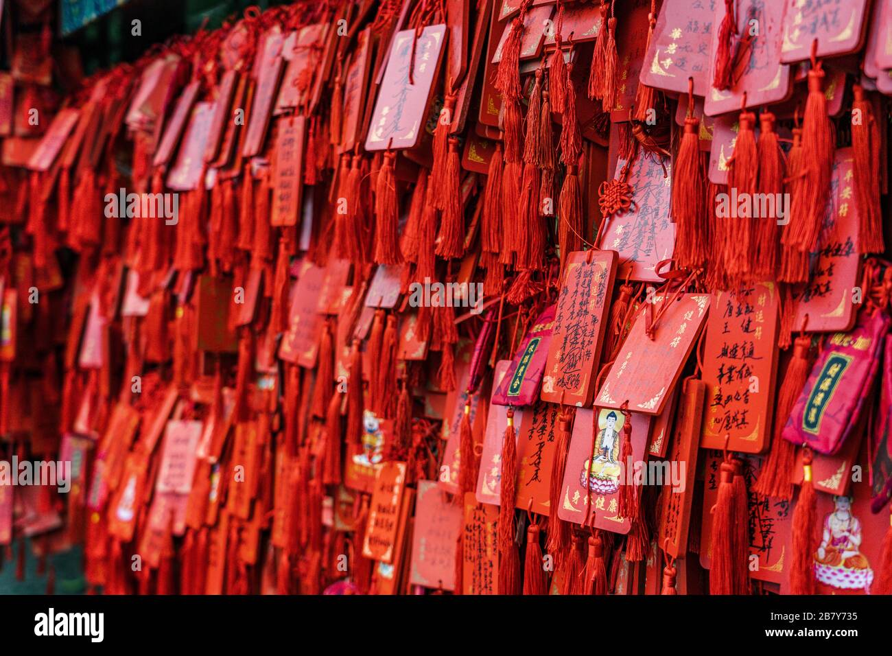 Chongqing, China - Dec 20, 2019: Red praying wish cards hang on ...