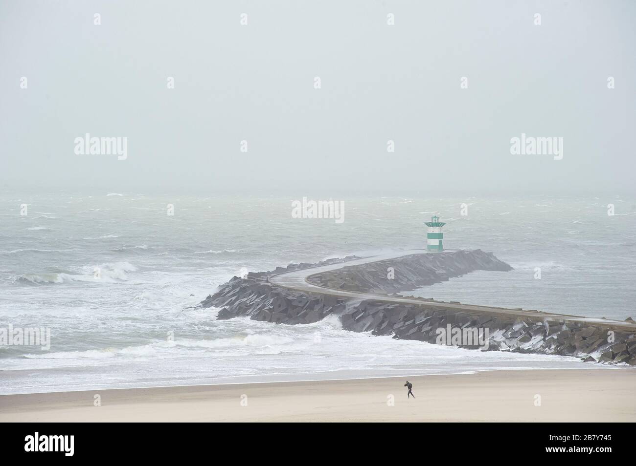 Beach at scheveningen in stormy weather hi-res stock photography and ...