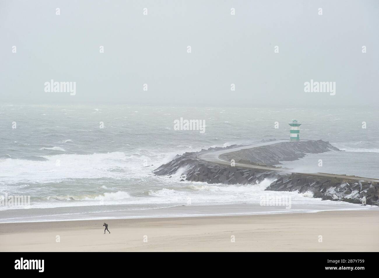 Beach at scheveningen in stormy weather hi-res stock photography and ...