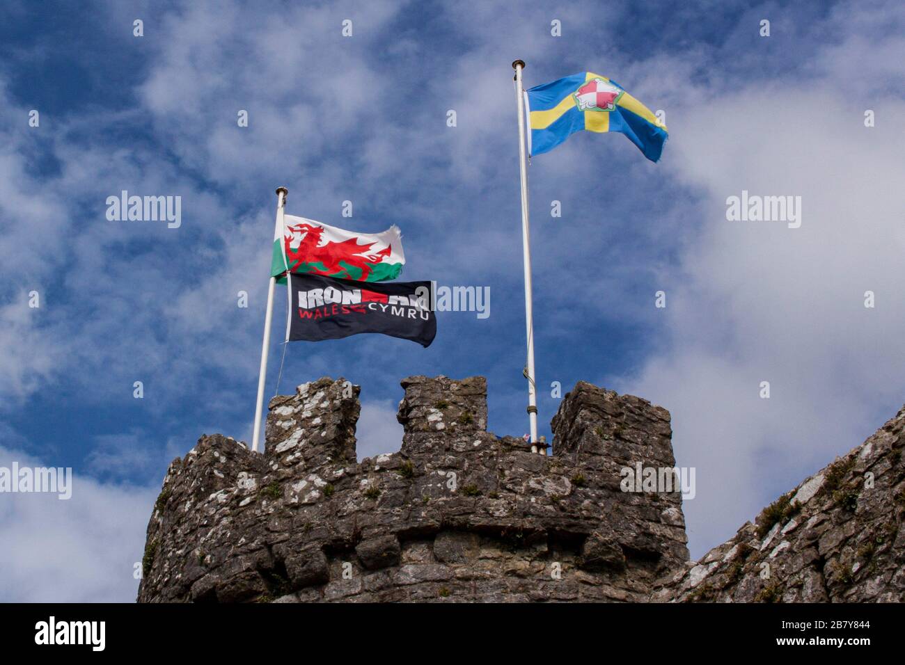 Flags fly above Tenby ahead of the 2017 Ironman Wales Triathlon Stock ...
