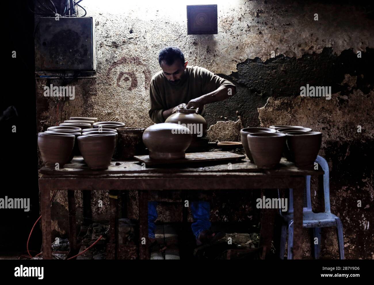 Gaza City, The Gaza Strip, Palestine. 18th Mar, 2020. A Palestinian man ...