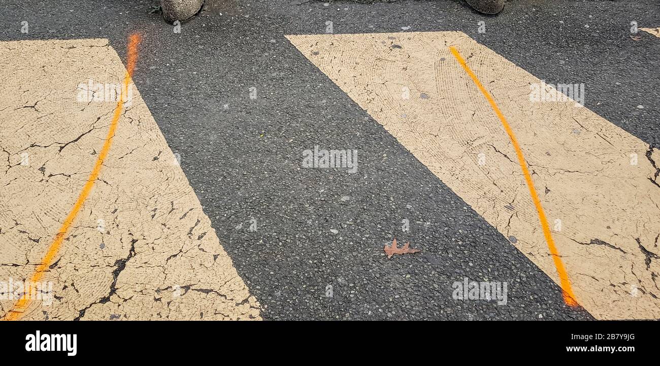 Chartres, France - March 17, 2020: Signs on the asphalt indicating the ...