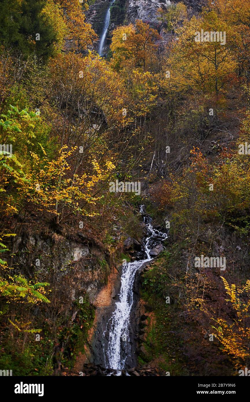 Small waterfall falls into the river Stock Photo - Alamy