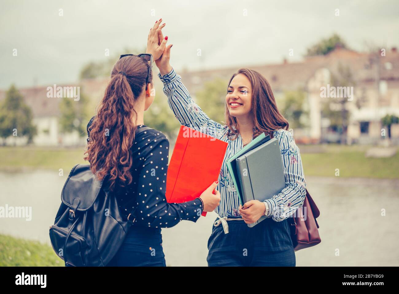 Women Helping Each Other High Resolution Stock Photography and Images ...