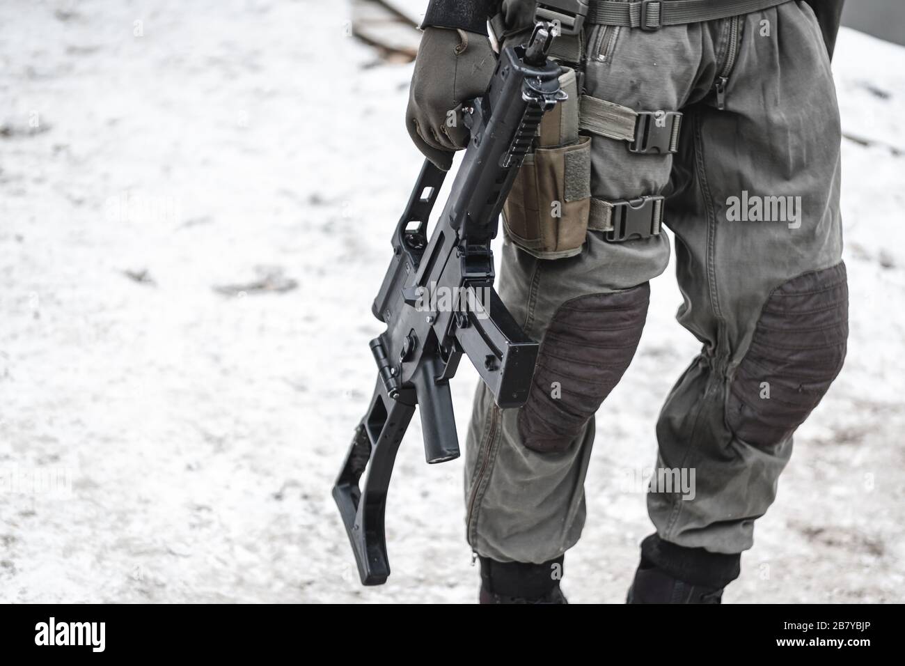 Machine gun man walking hi-res stock photography and images - Alamy