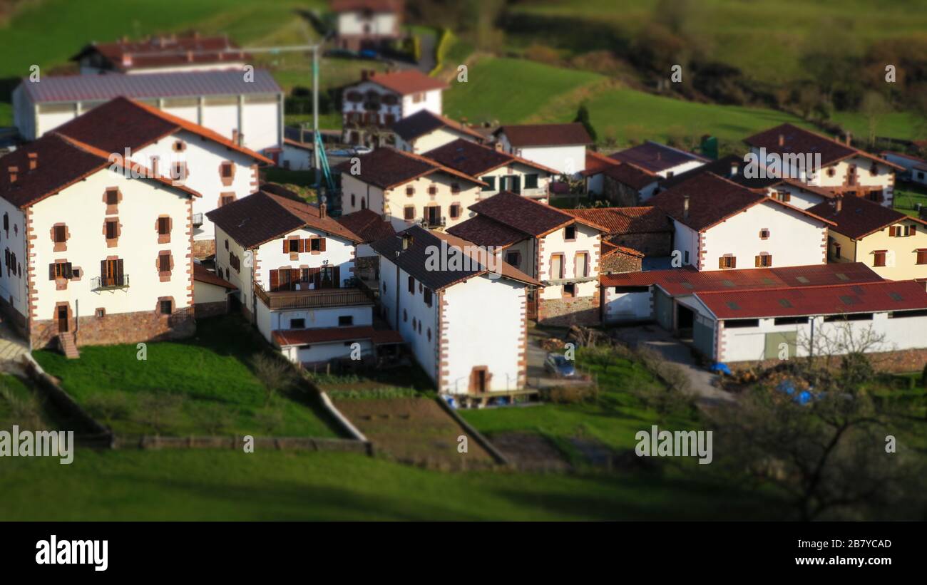 Layout of a town with small houses and mountains Stock Photo - Alamy
