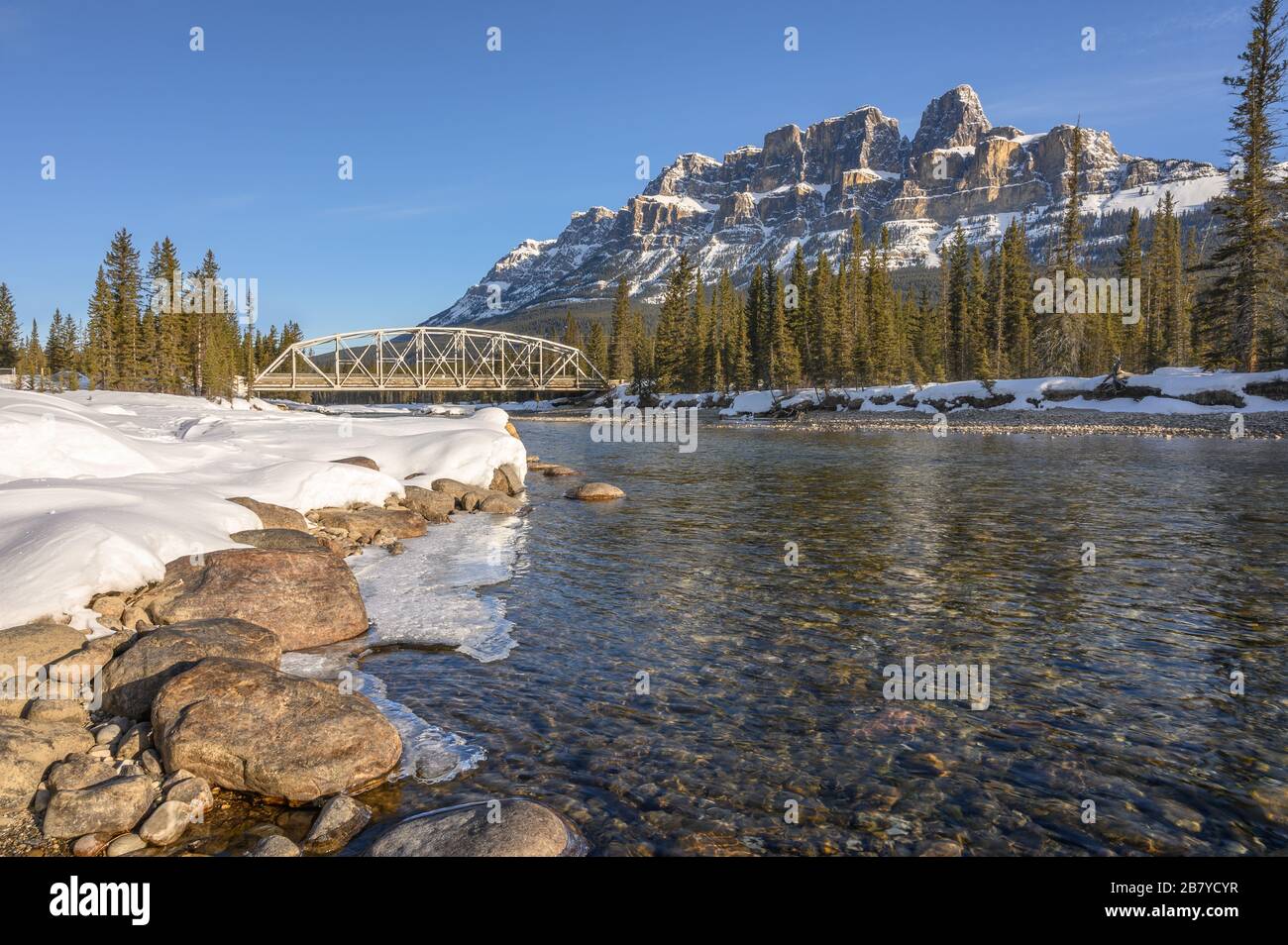 Winter view of the steel truss bridge over the Bow River at Castle ...