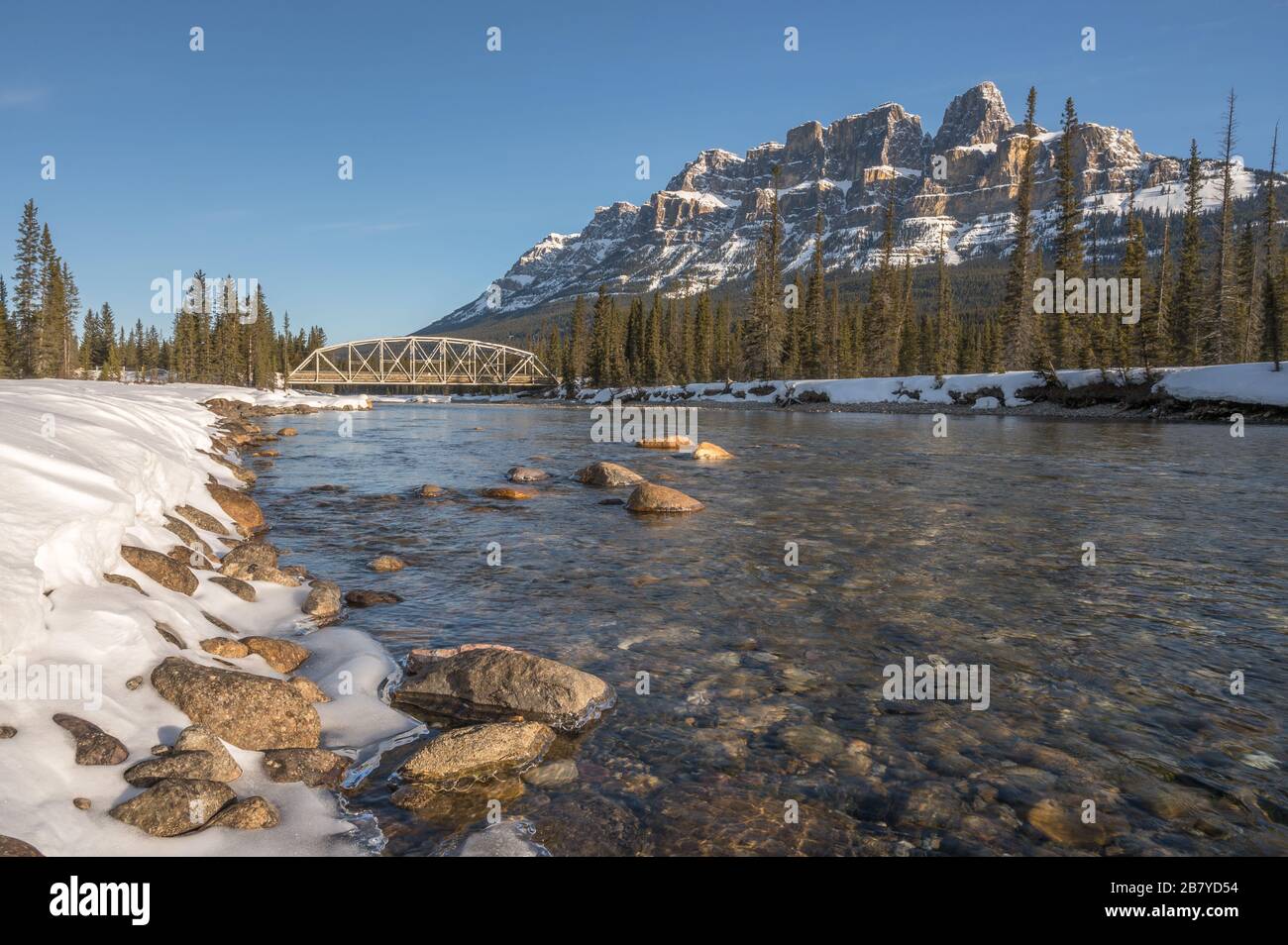 Winter view of the steel truss bridge over the Bow River at Castle ...