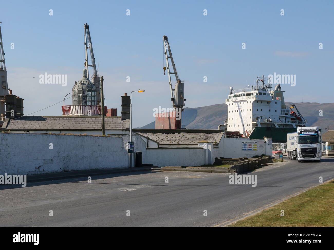 Port cranes and tanker moored in the Port of Greenore, County Louth ...