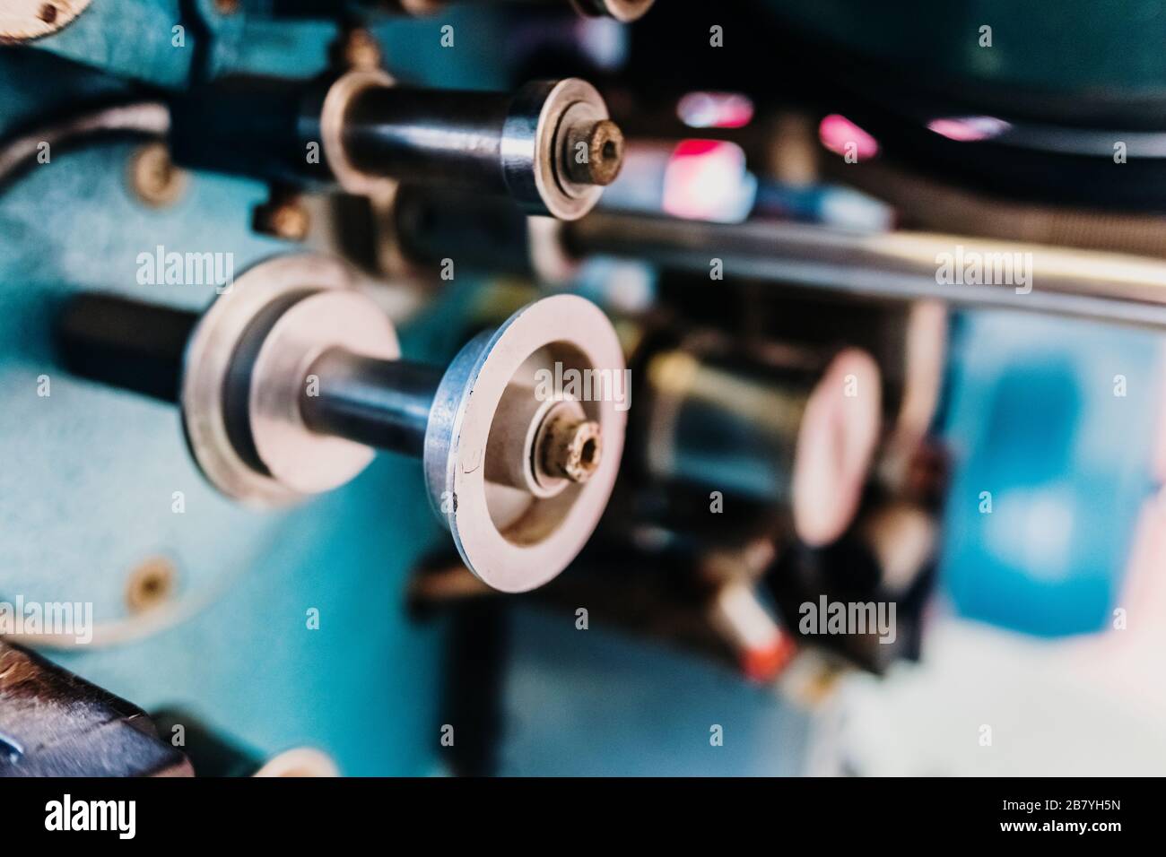 Detail of the metal elements of a machine, with steel rollers Stock ...