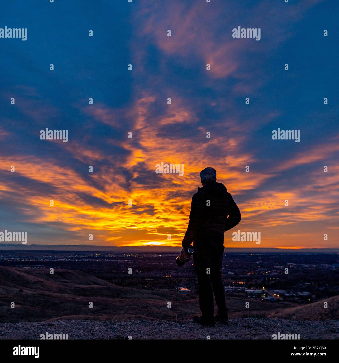 Silhouette of senior man at sunset Stock Photo - Alamy