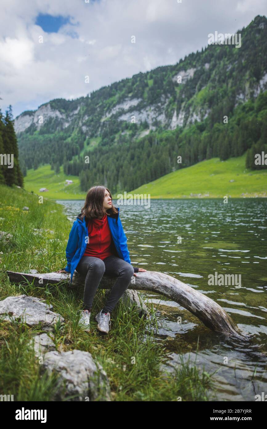 Caucasian woman sitting log hi-res stock photography and images - Alamy
