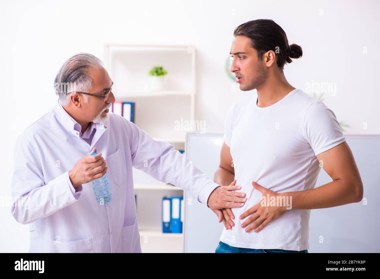 The doctor dietician giving advices to fat overweight patient Stock ...