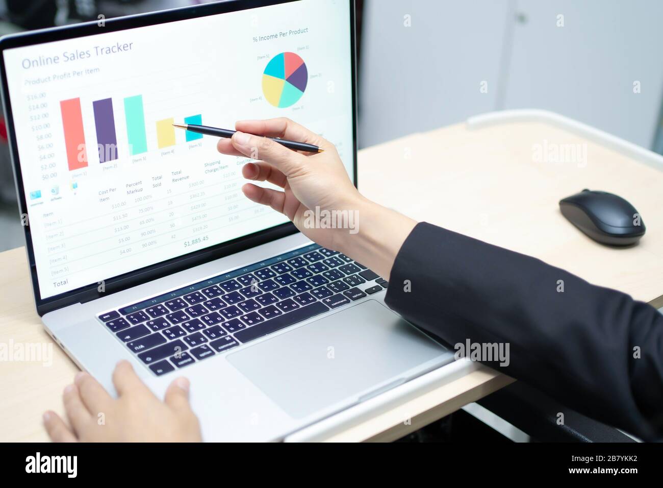 Asian accountant type keyboard to enter information, working, calculate ...