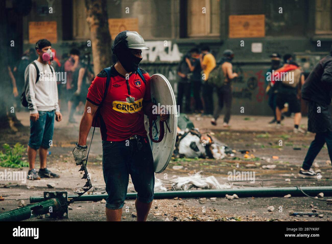 SANTIAGO, CHILE-NOVEMBER 8, 2019 - Protester protect themselves from ...