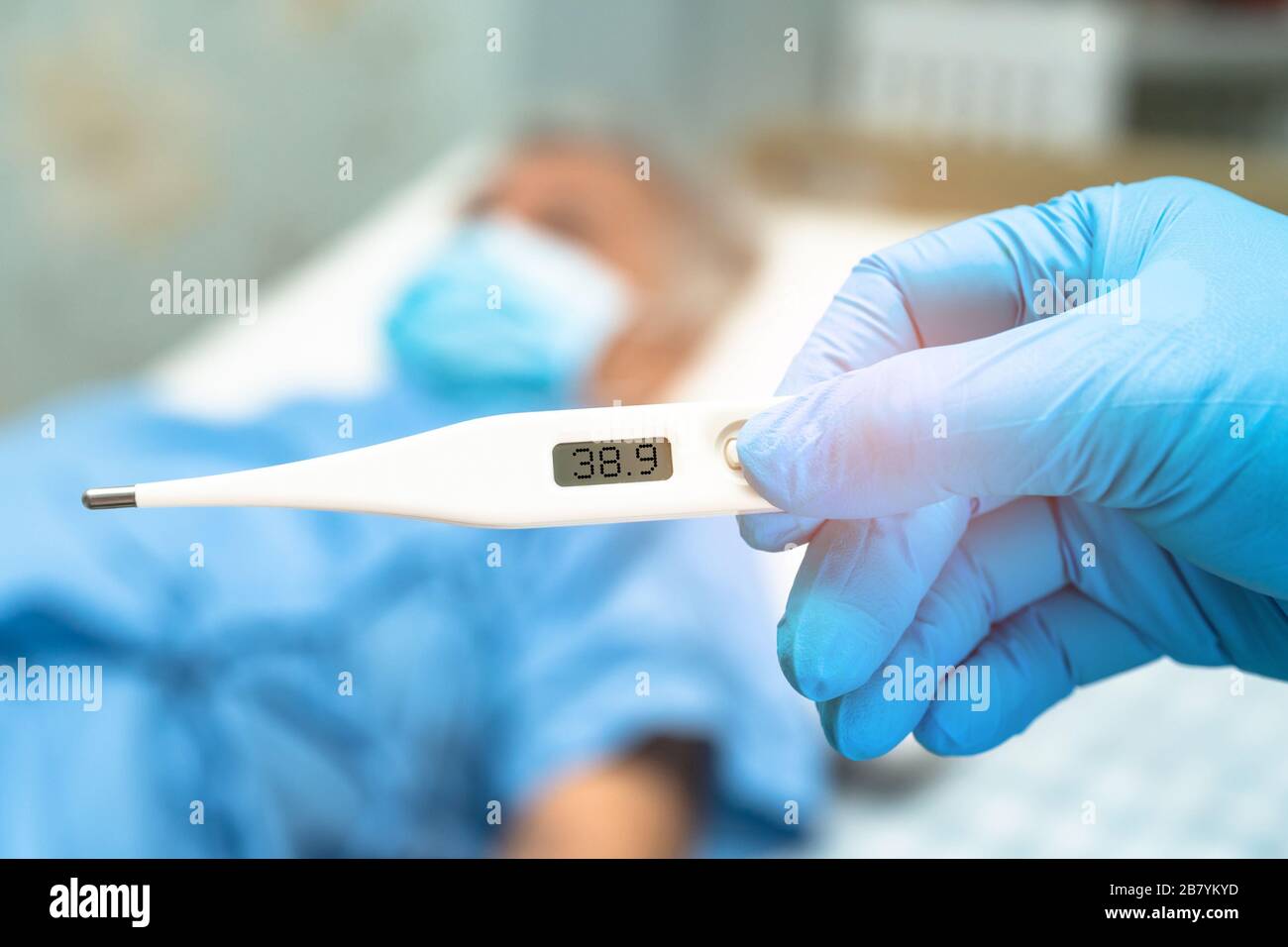 Caucasian asian woman sick thermometer hi-res stock photography and ...