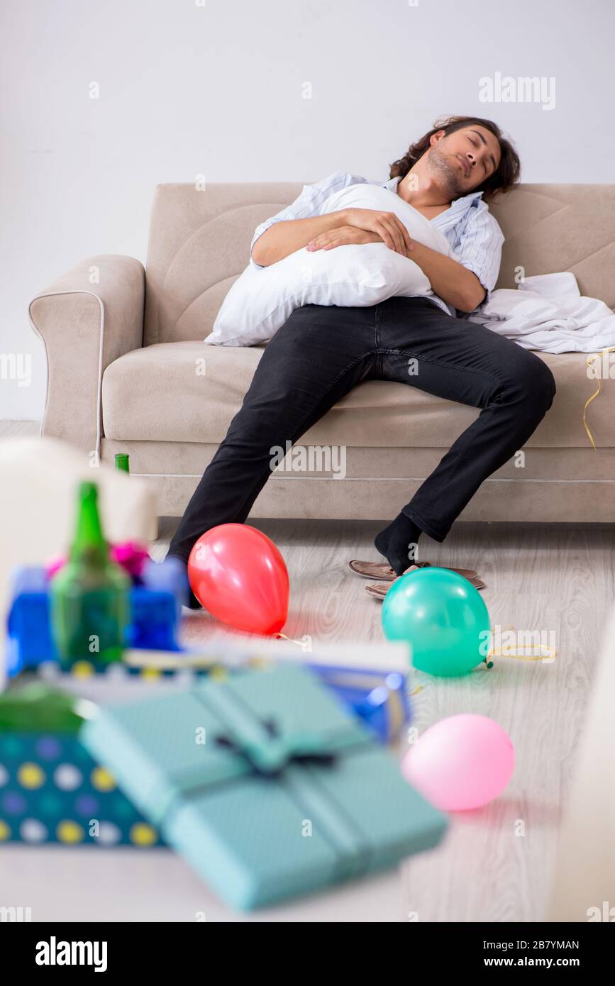 The young man celebrating his birthday at home Stock Photo - Alamy