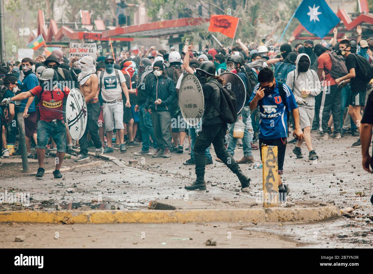 SANTIAGO, CHILE-NOVEMBER 8, 2019 - Protesters protect themselves from ...