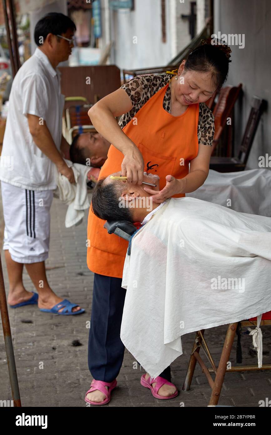 Barber stall hi-res stock photography and images - Alamy