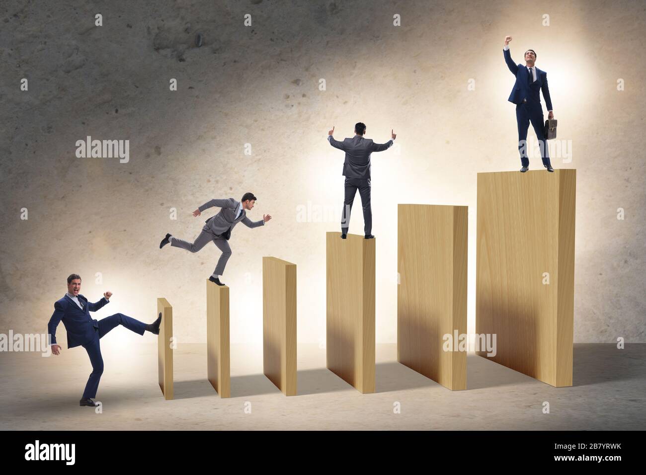Domino effect and the competition concept Stock Photo - Alamy