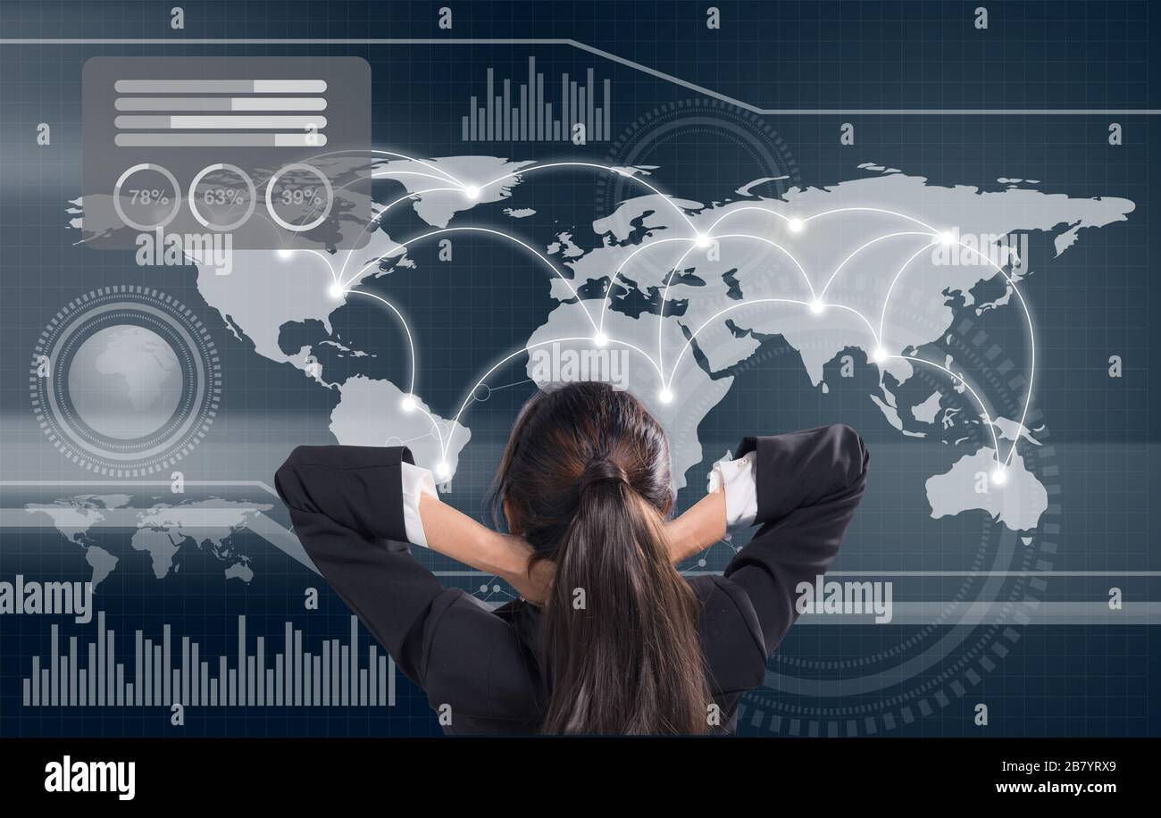 business woman looking at some chart - graphs and calculations on a ...