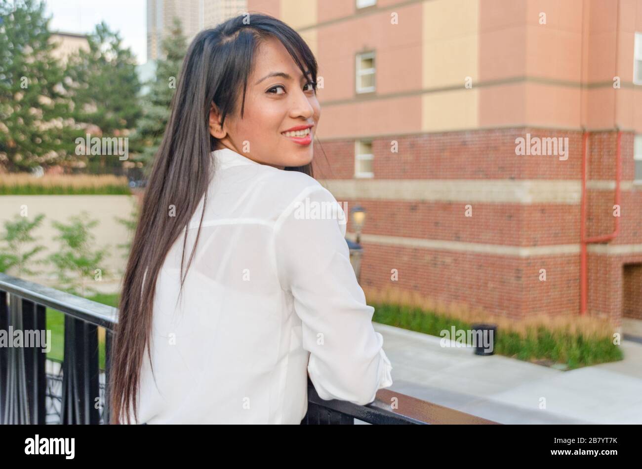 Woman smiling happily at Indiana downtown United States of America ...