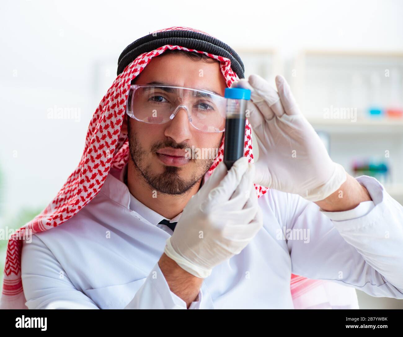 The arab chemist scientist testing quality of oil petrol Stock Photo ...