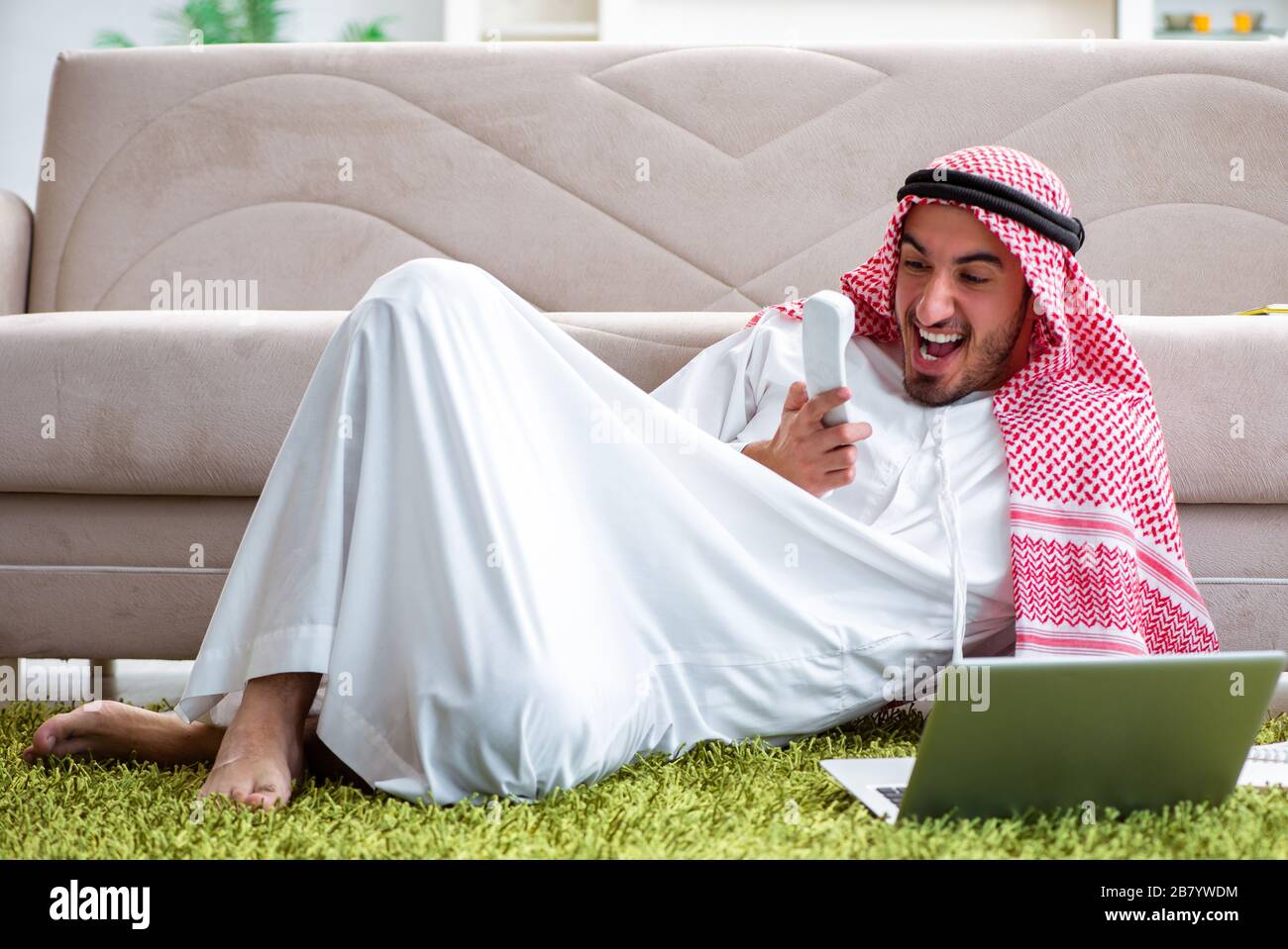 The arab man working at home on his work Stock Photo - Alamy