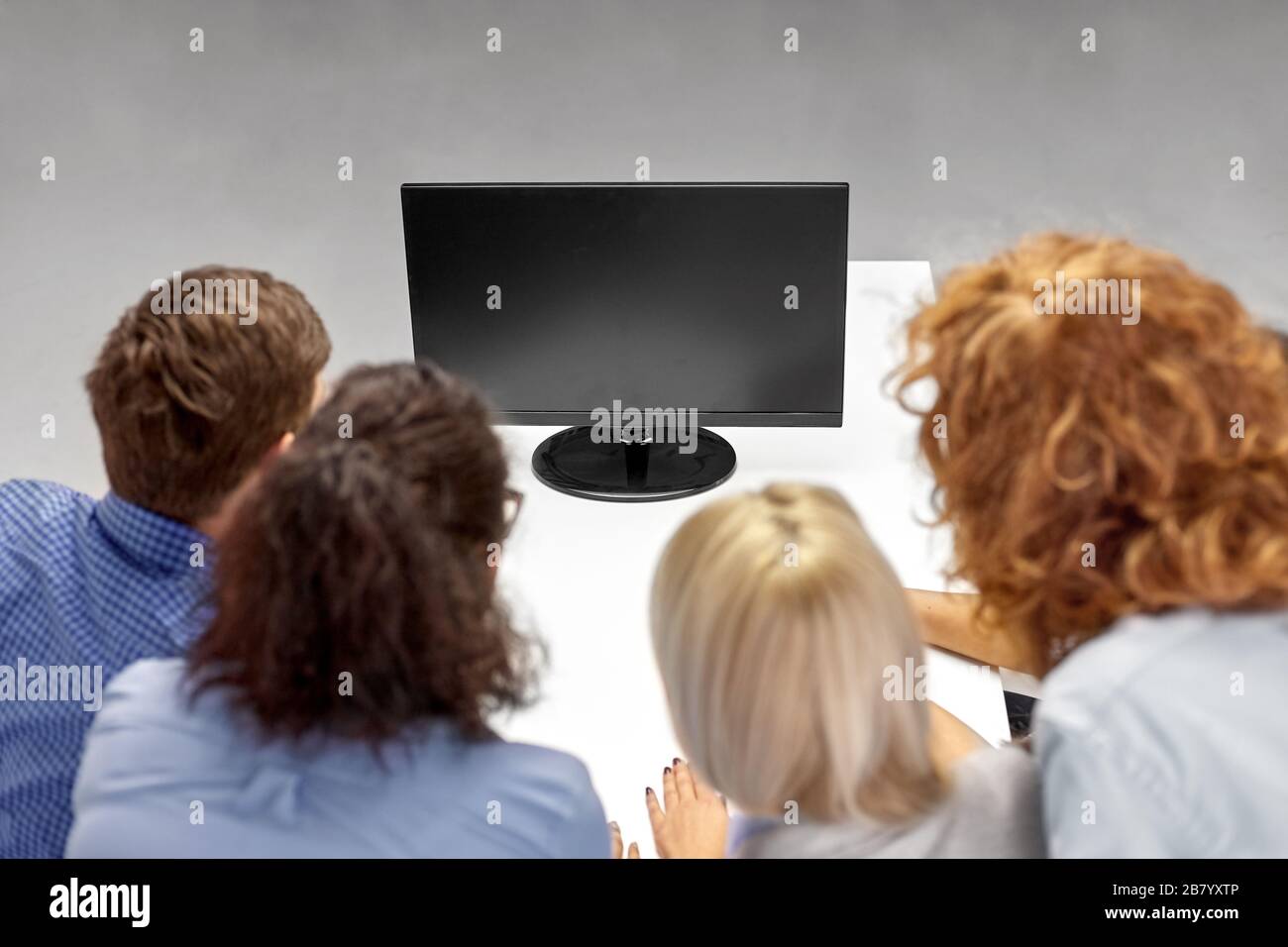 business team with computer working at office Stock Photo - Alamy