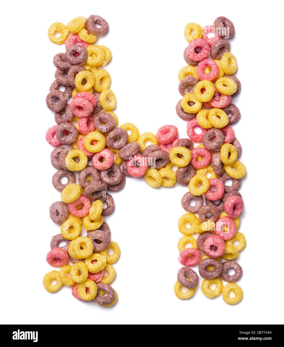 Letter H of the English alphabet from pink colored flakes on a white ...