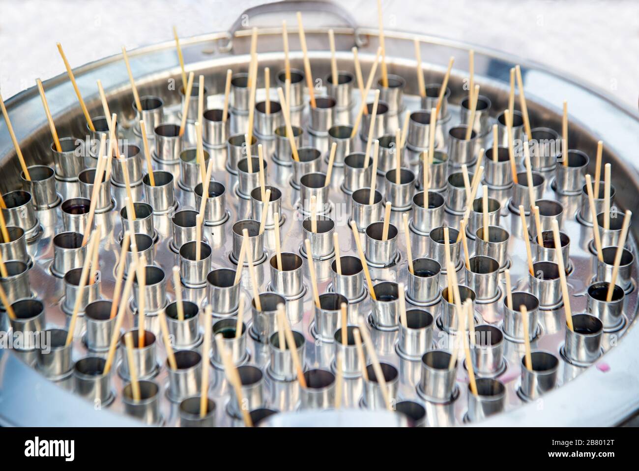 Traditional Thai ice cream in a tube made by rotating in a bucket ...