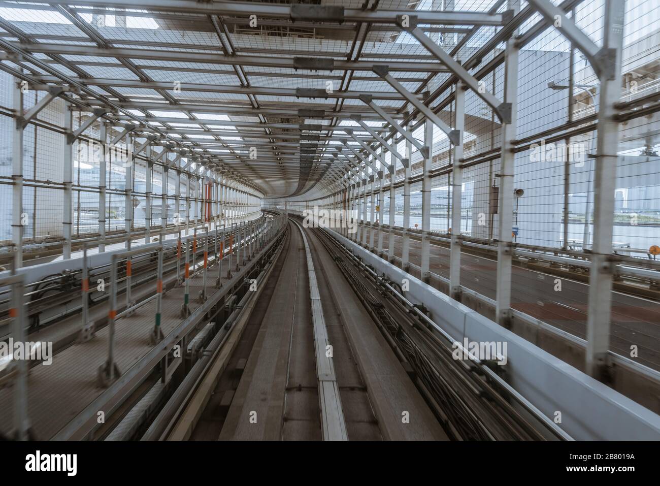 tunnel of monorail road view from front window of a moving train ...
