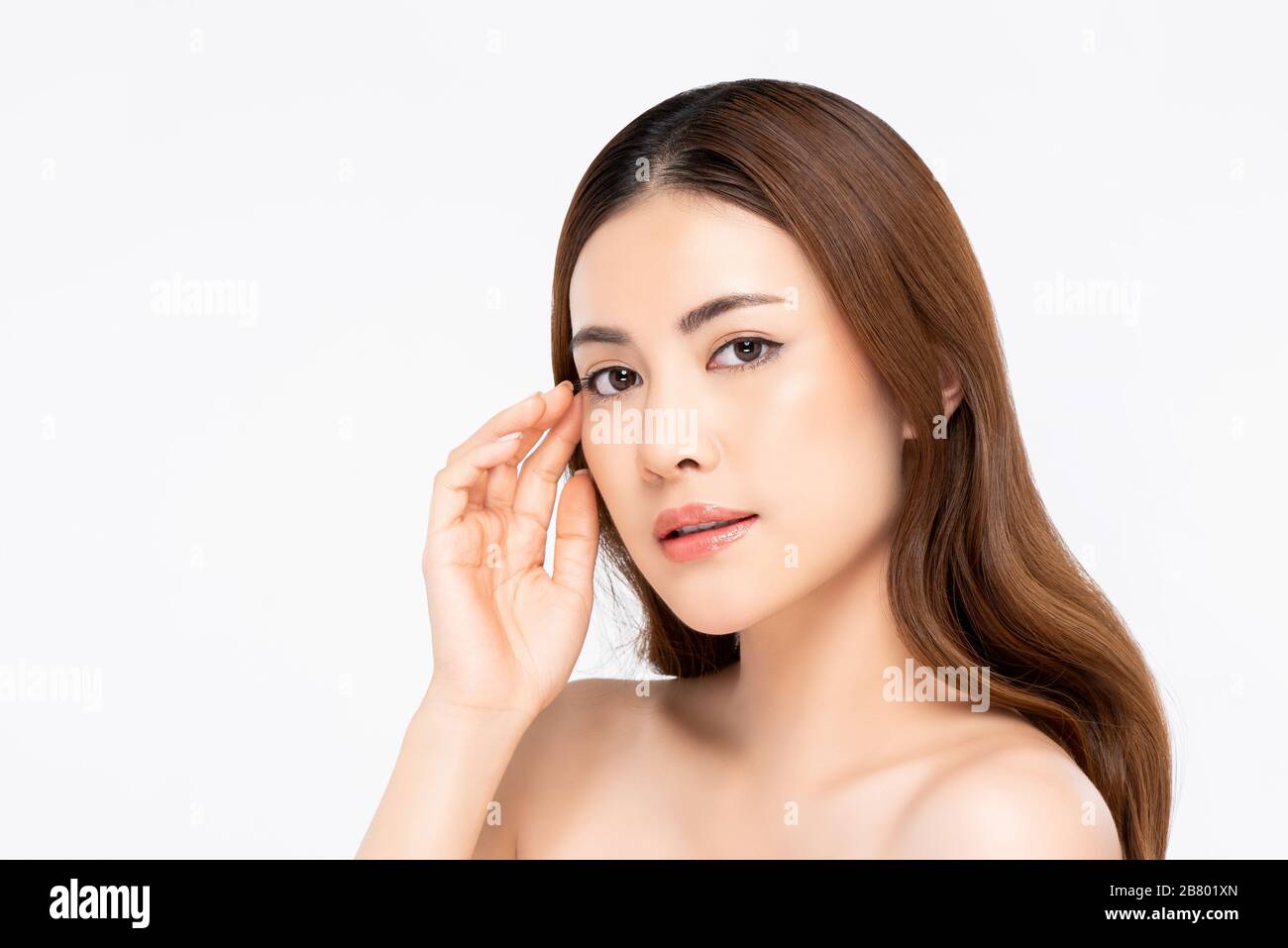 Beauty shot of Asian woman model with clear fair skin doing hand ...