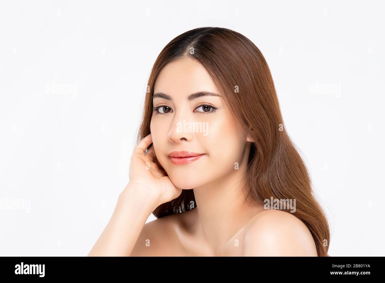 Beauty shot of Asian woman model with clear fair skin doing hand ...