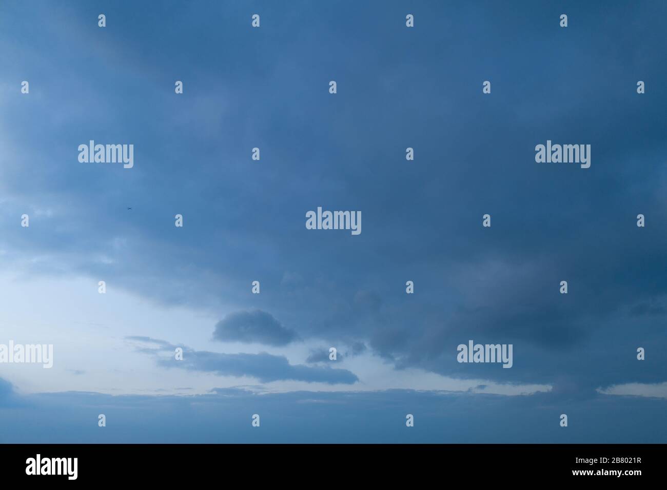 Beautiful sky with stretched clouds during twilight Stock Photo - Alamy