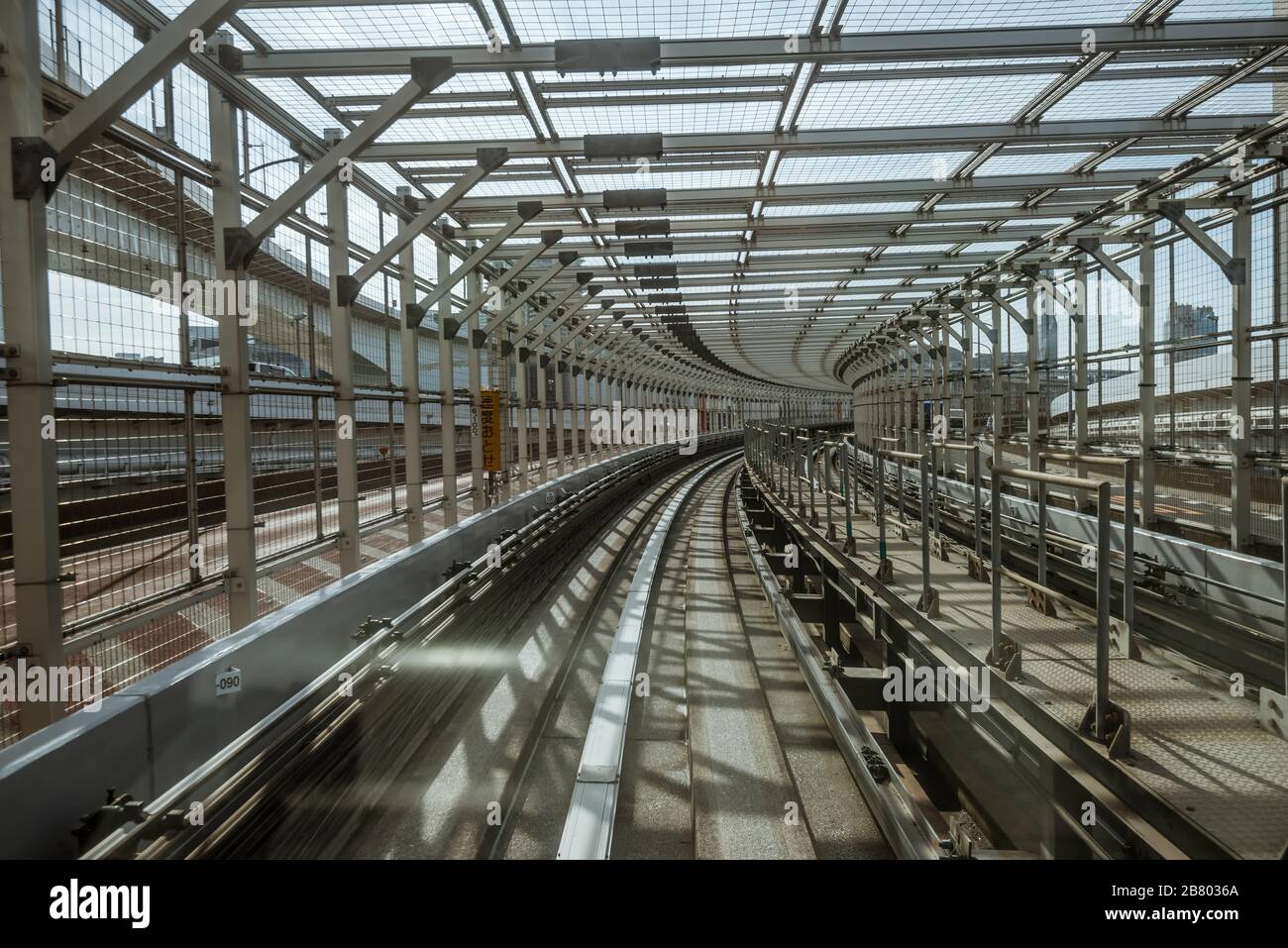 tunnel of monorail road view from front window of a moving train ...