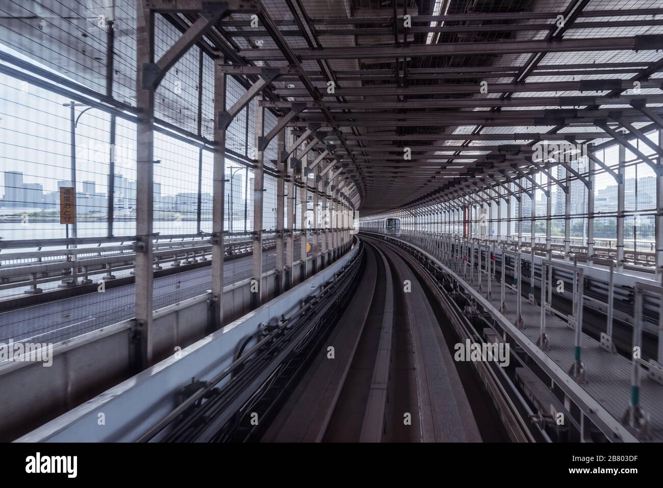 tunnel of monorail road view from front window of a moving train ...