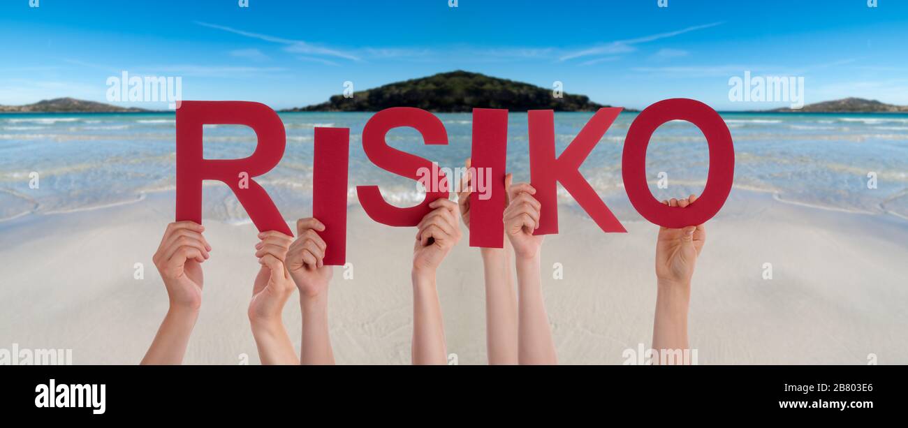People Hands Holding Word Risiko Means Risk, Ocean Background Stock ...
