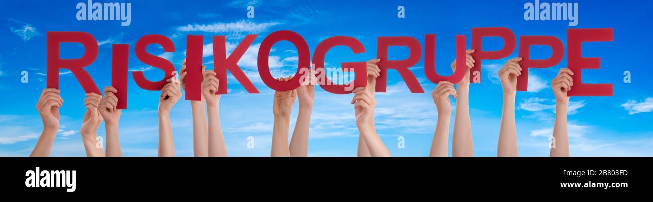 People Hands Holding Word Risikogruppe Means High-Risk Group, Blue Sky ...