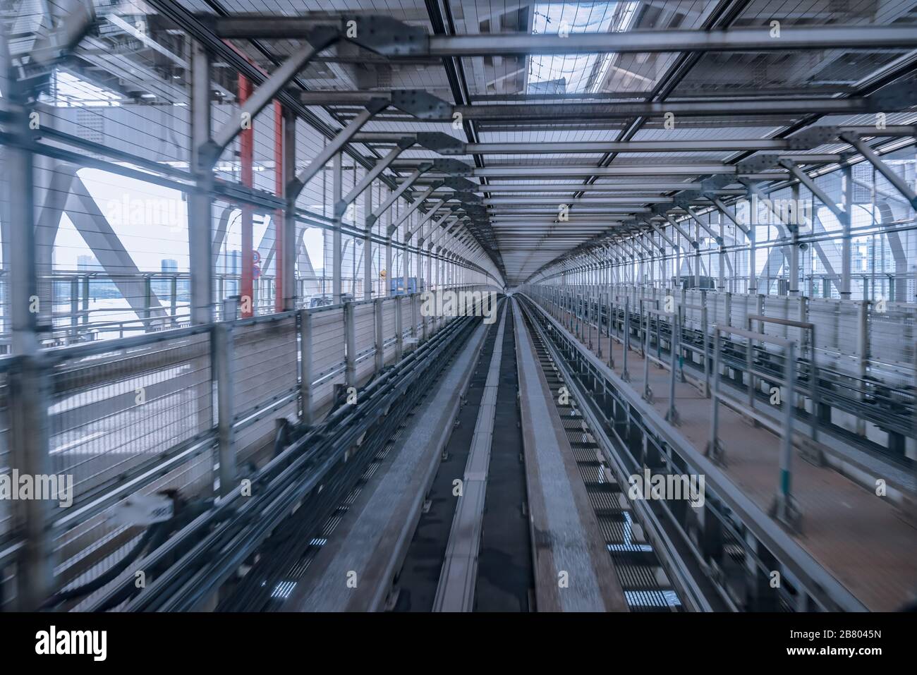 tunnel of monorail road view from front window of a moving train ...