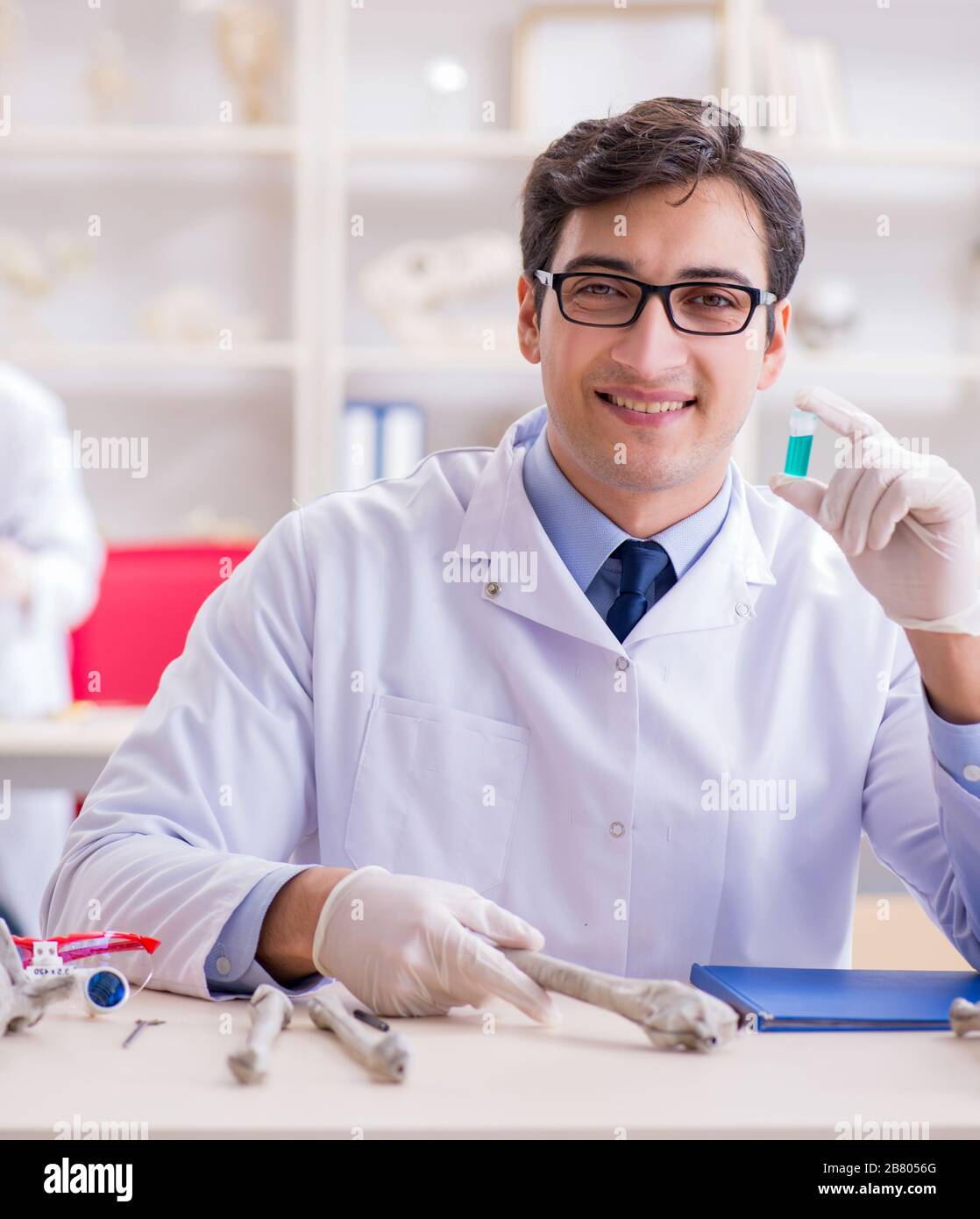 The professor studying human skeleton in lab Stock Photo - Alamy