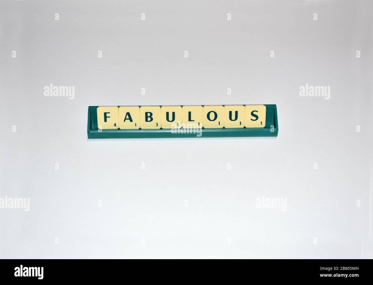 Scrabble tiles spell out Fabulous. Motivational quote Scrabble Blocks ...