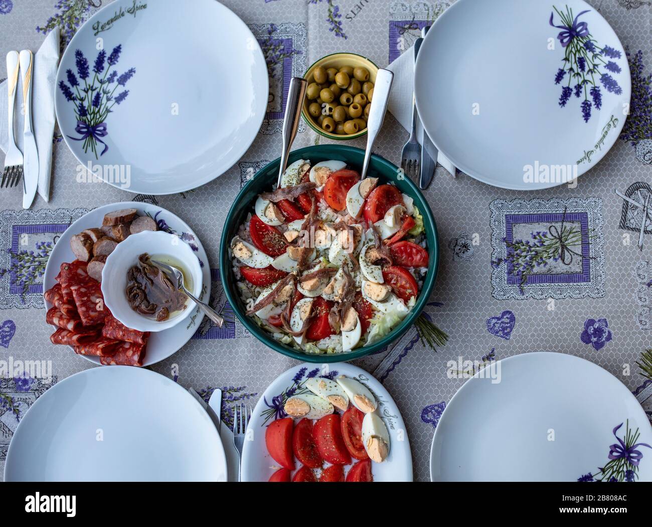 Prepared for supper table on the terrace Stock Photo - Alamy